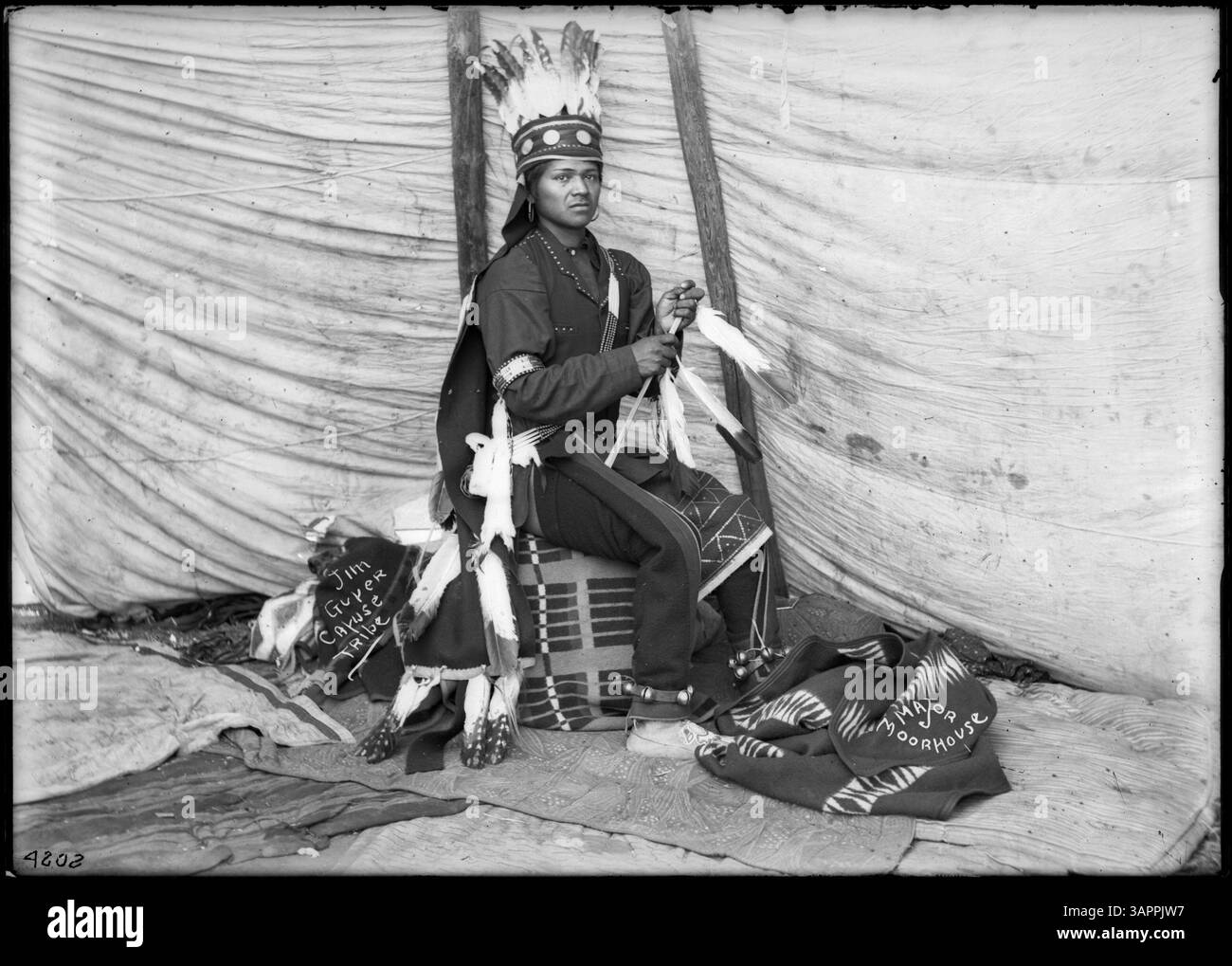 A photograph of Jim Guyer, a member of the Cayuse Tribe, seated in ...