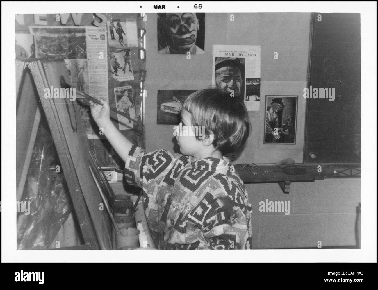 This image features a portrait painting created on an easel, capturing ...