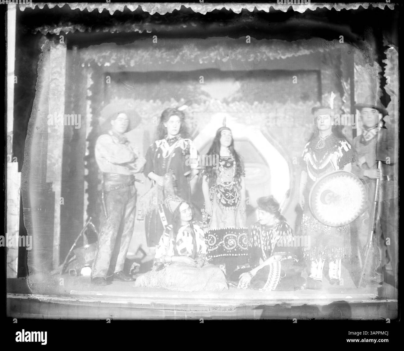 Photograph of a tableau featuring cowboys and women dressed as Indians ...
