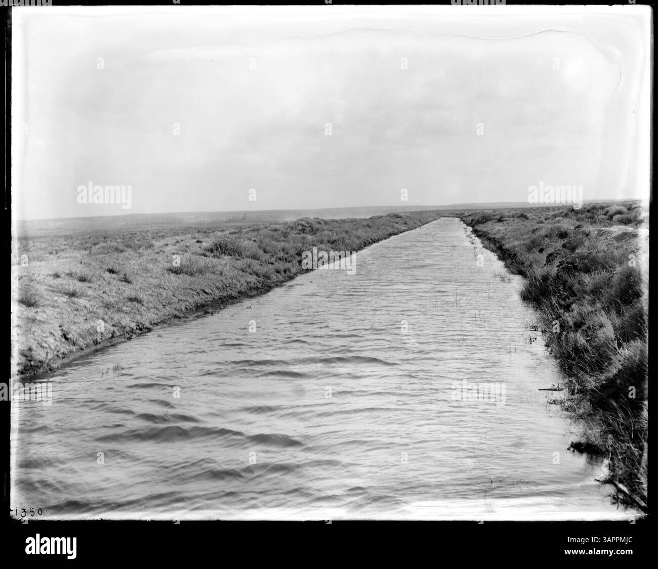 A photograph of the Hinkle irrigation canal, featuring flumes and water ...