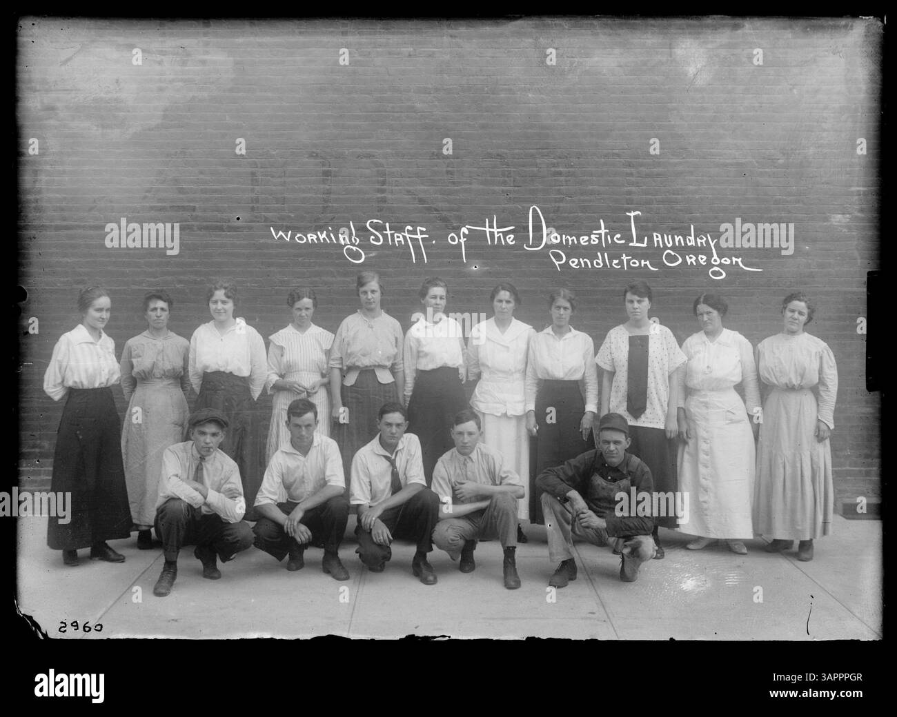 A photograph by Lee Moorhouse featuring the working staff of the ...