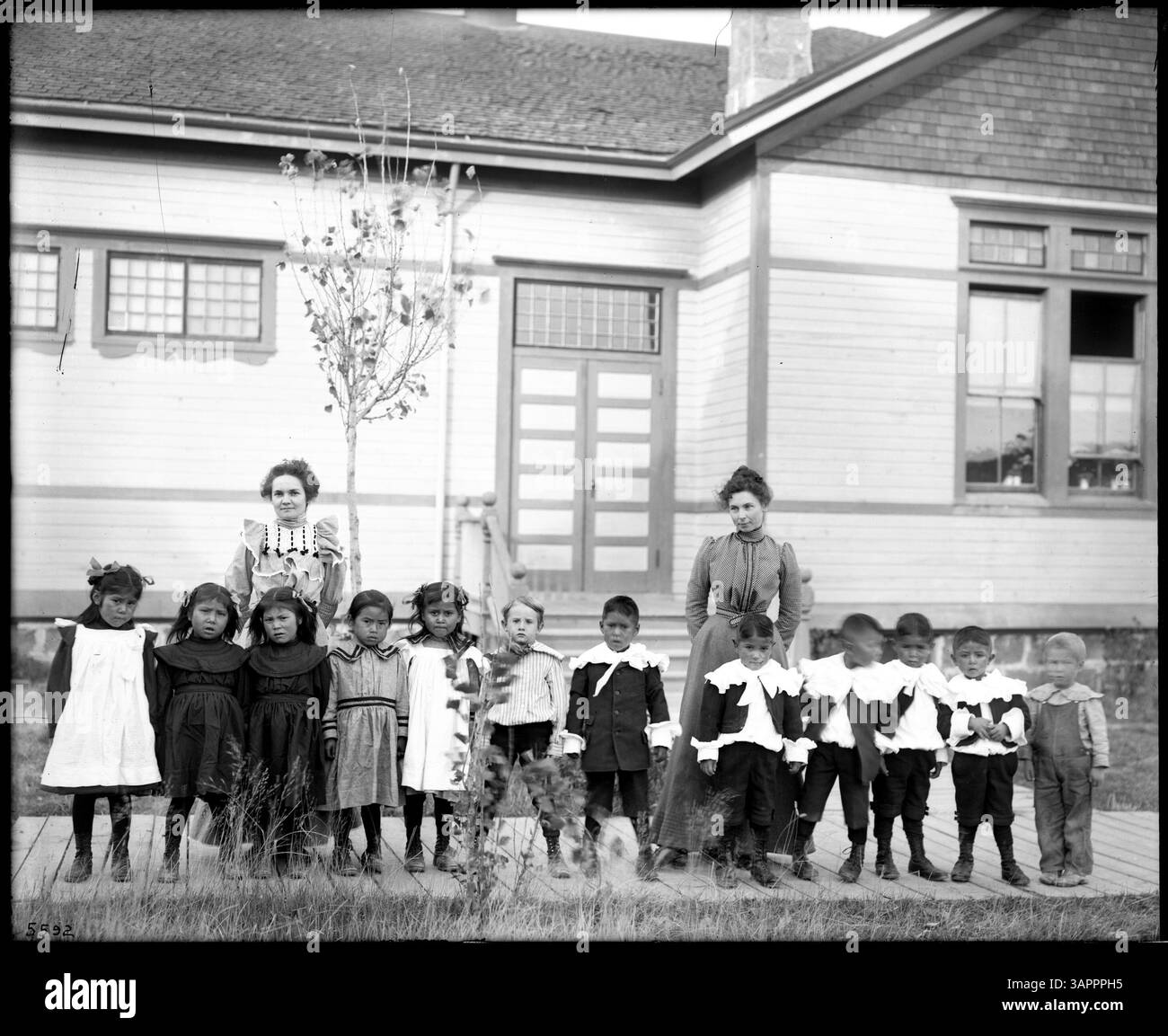 Photograph of teachers and pupils of the Warm Springs Indian school in ...