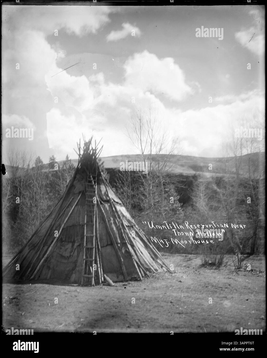 This photograph by Lee Moorhouse depicts an Indian camp on the Umatilla ...