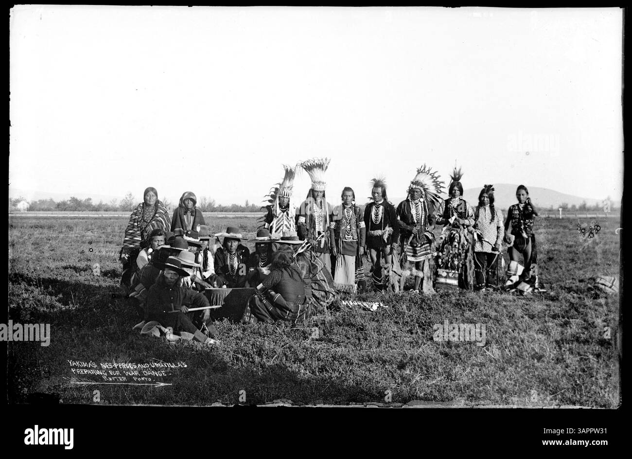 The photograph shows Yakama, Nez Perce, and Umatilla people preparing ...