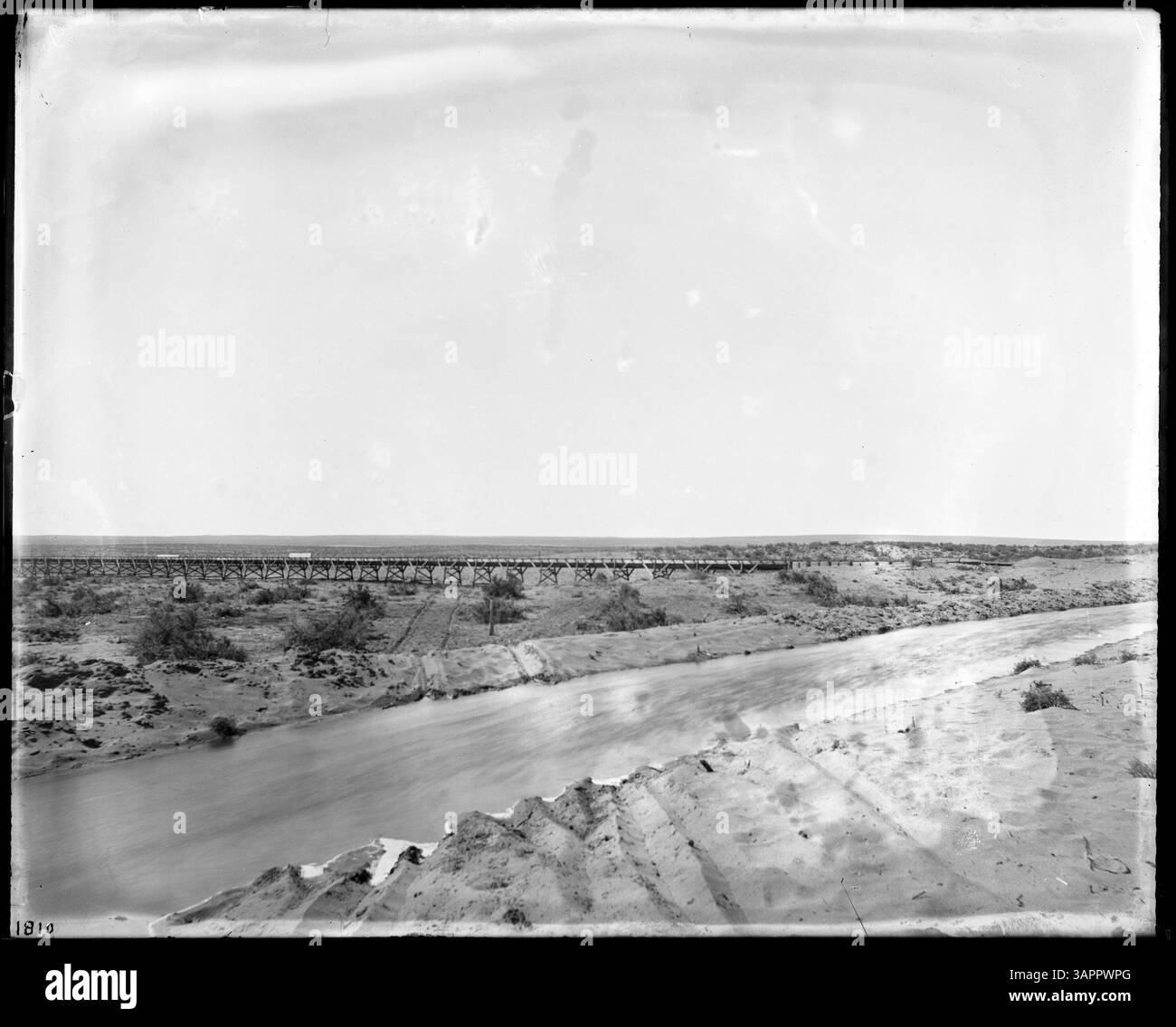 Photograph by Lee Moorhouse of an irrigation dam, flume, and spillways ...
