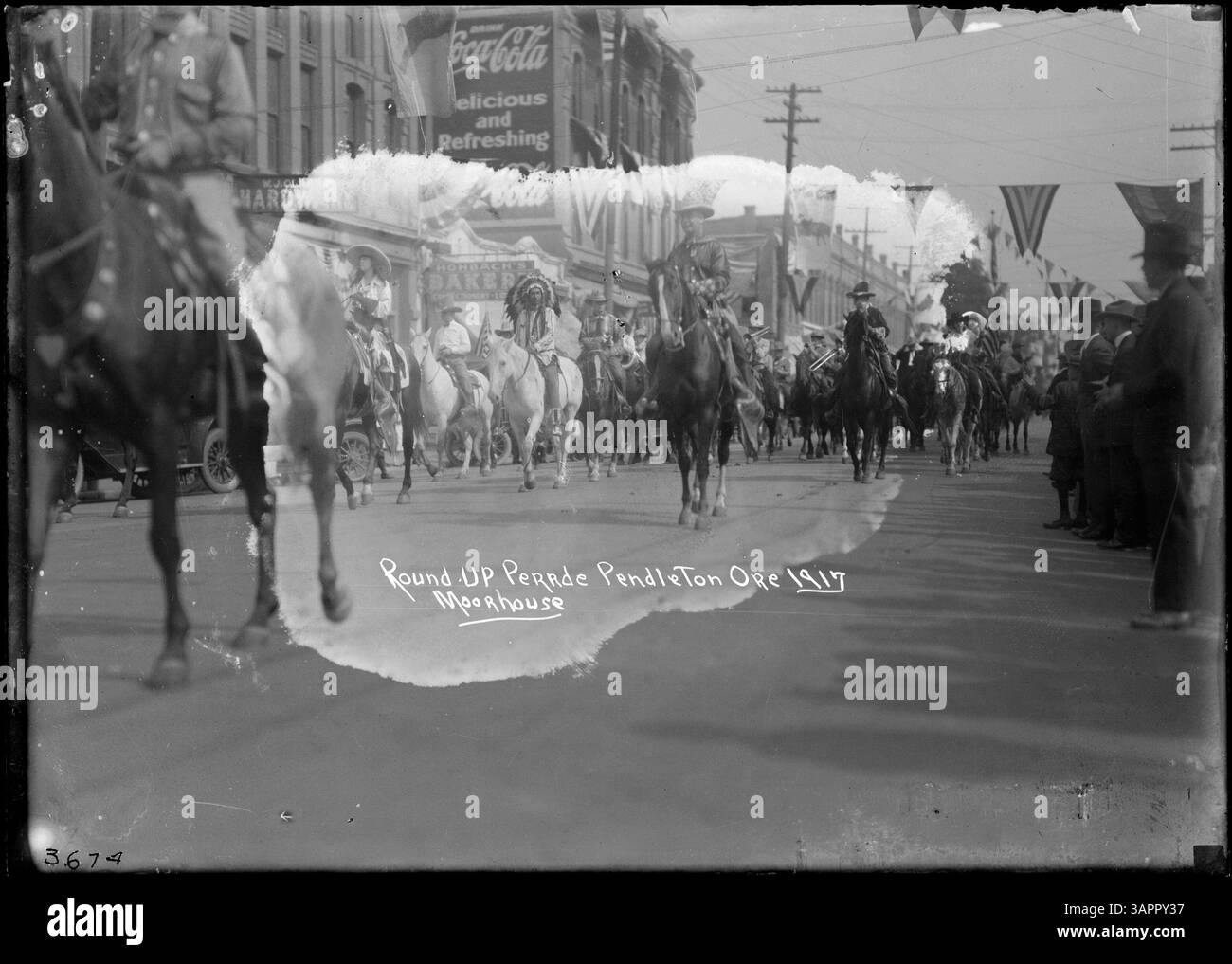 This photograph depicts a roundup parade, showcasing Western traditions ...