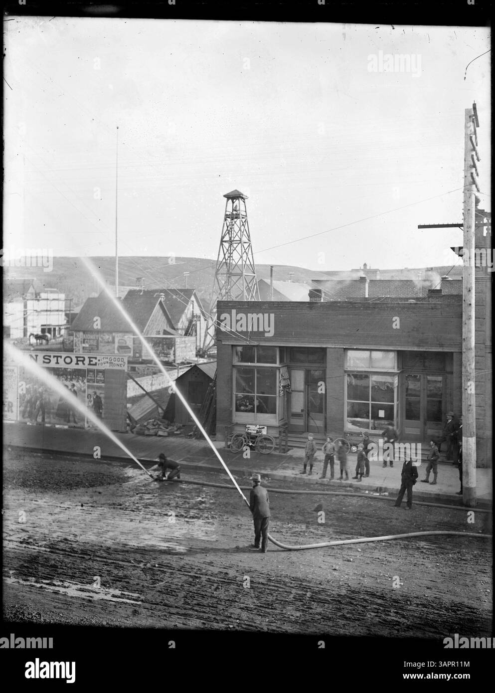 Lee Moorhouse’s photograph captures fire hoses in operation in ...