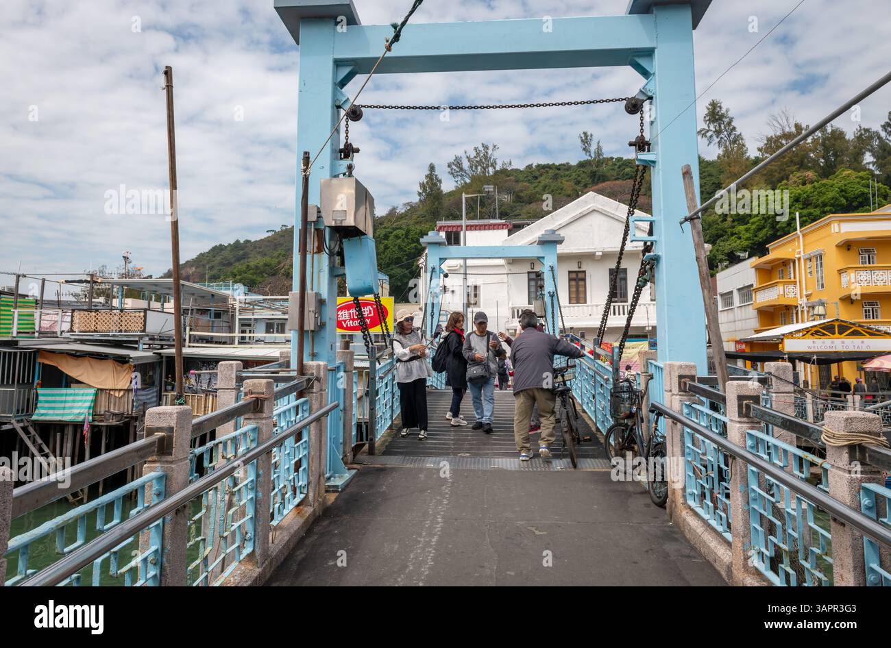 Hong Kong. China- 02.27.2025. The Tai O Market Street draw bridge ...