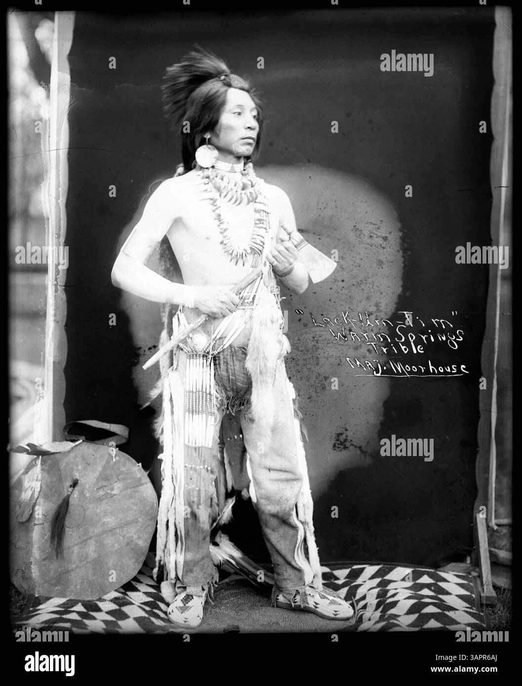 Lack-um-tim, a Warm Springs Indian, is shown in traditional regalia in ...