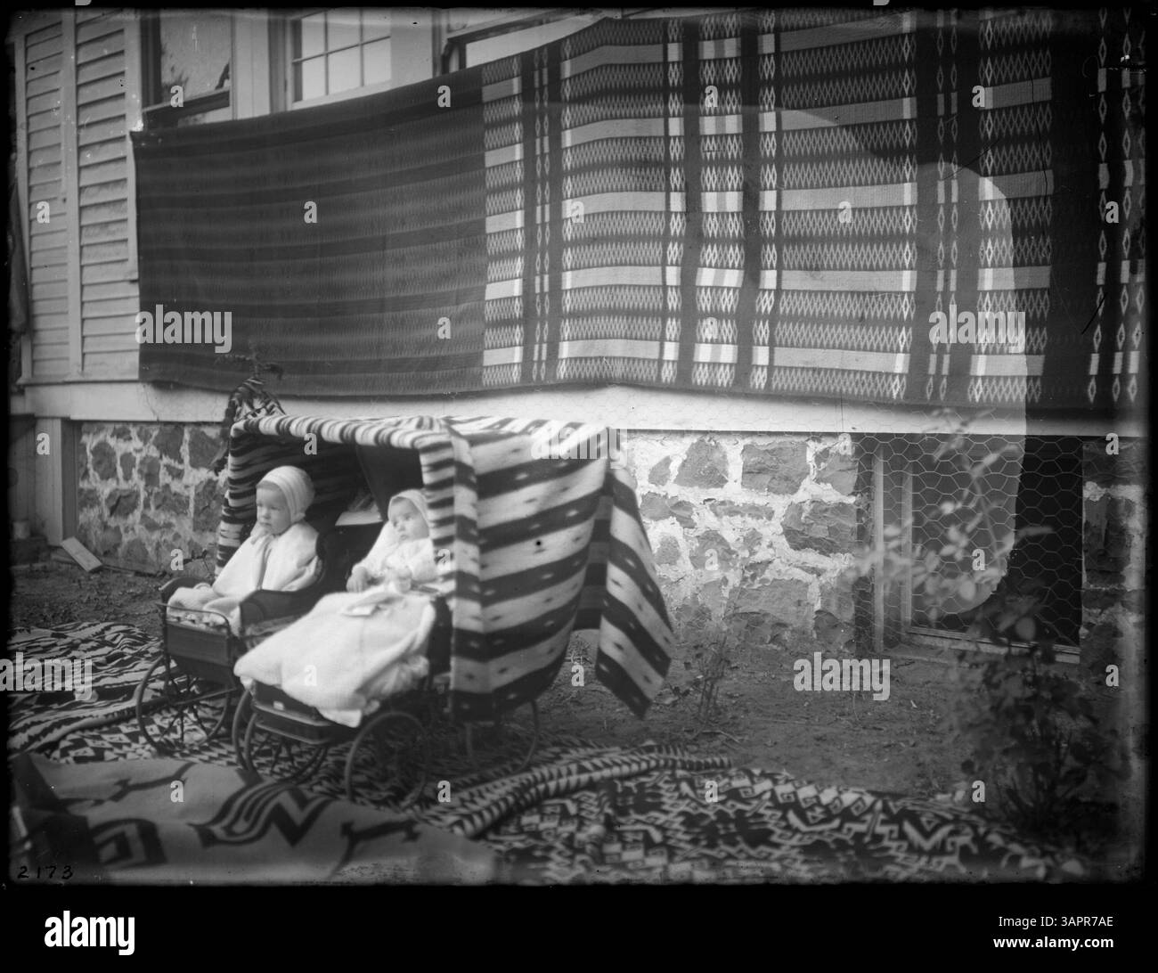 A photograph showing Pendleton Woolen Mill blankets on display with two ...