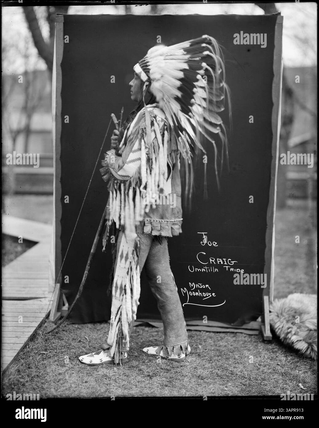 Joe Craig, a Umatilla Indian, is pictured in full regalia with a war ...