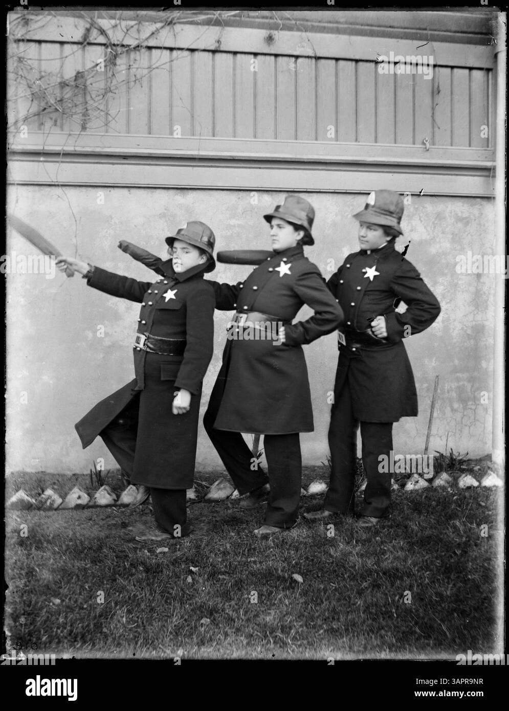 This photograph features actors performing in a theater at the ...