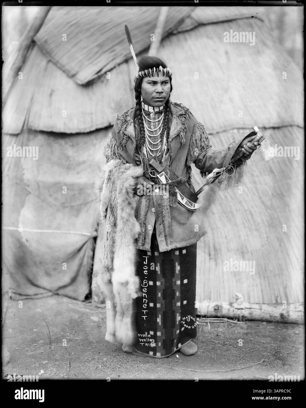 This image shows Joe Bennett from the Walla Walla Tribe in full regalia ...