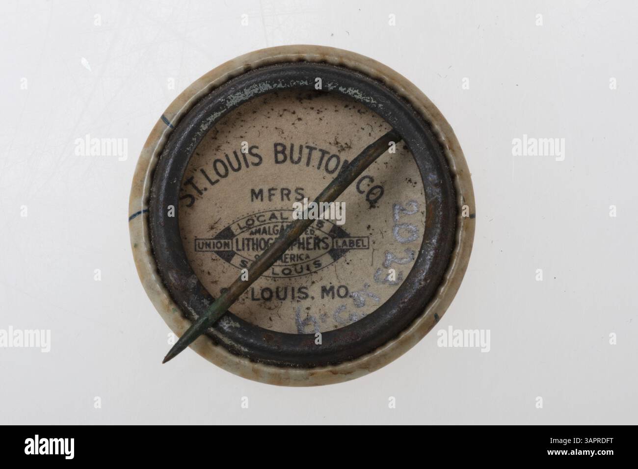 A button from the Pine Street YMCA, which served the Mill Creek Valley ...