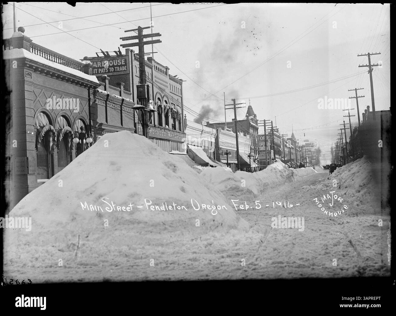 The photo shows Main Street in Pendleton, Oregon, covered in deep snow ...
