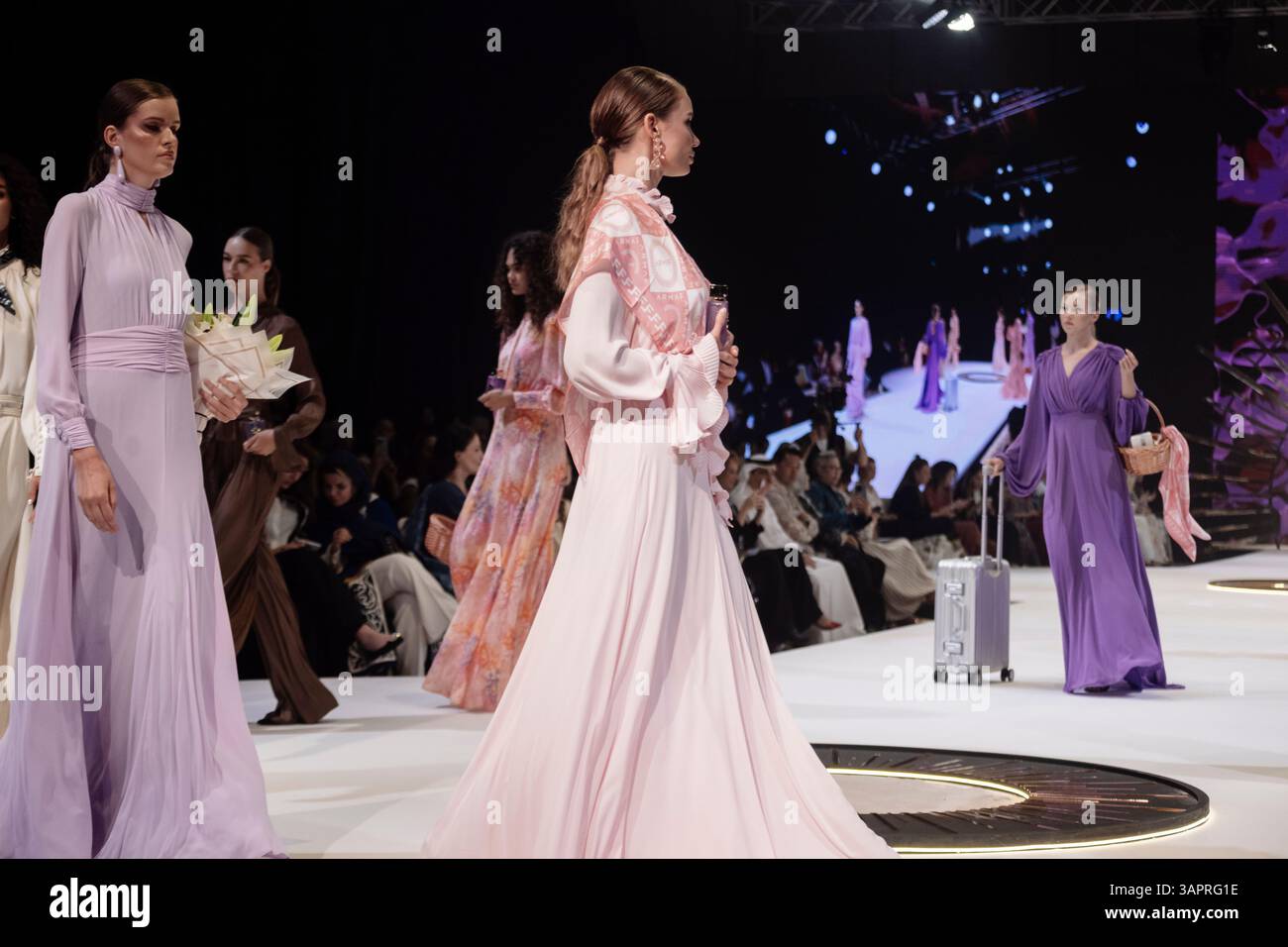 Models walk the runaway for Sterling Perfumes x Aywa London. Designers ...