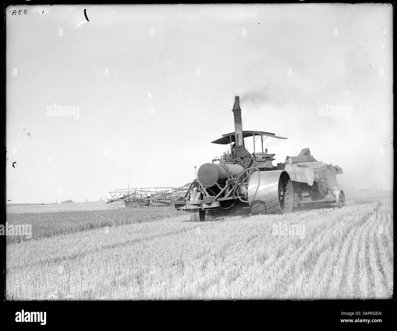This photograph by Lee Moorhouse shows a steam tractor pulling a ...