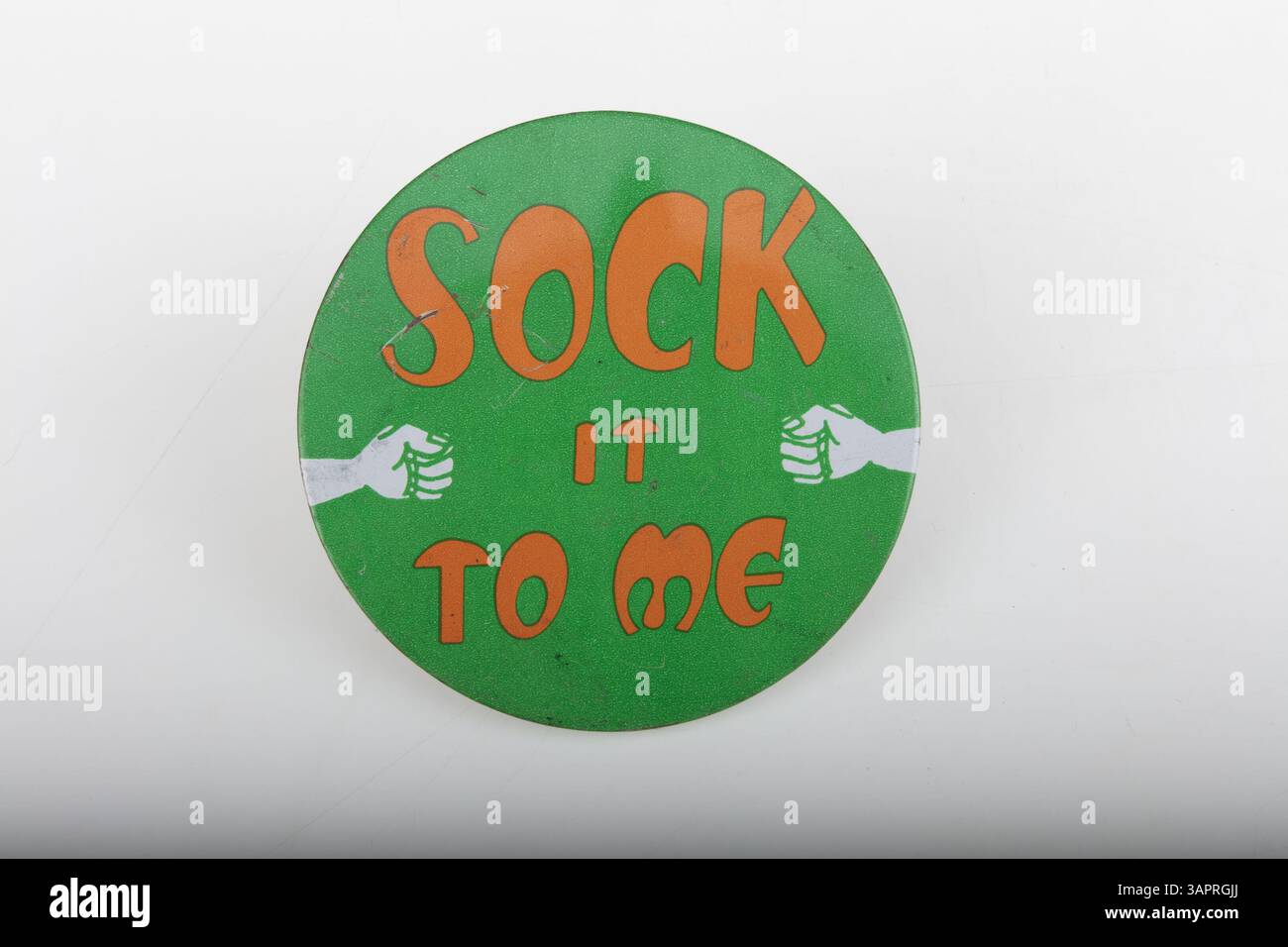 The 'Sock It to Me' button was worn by members of The Welders, one of ...
