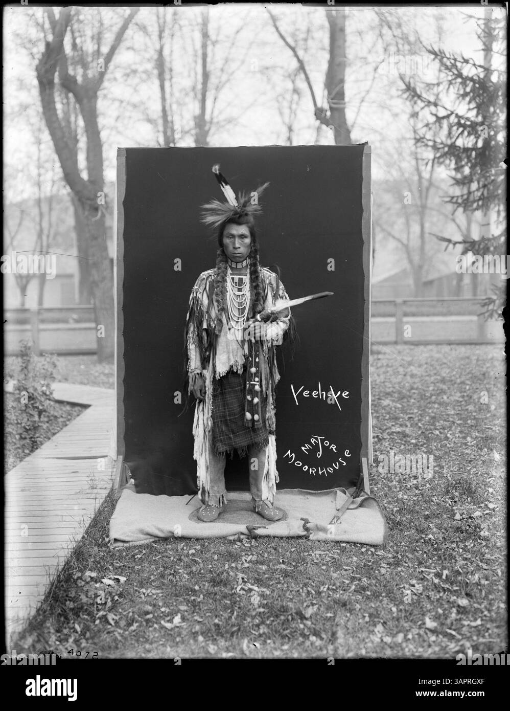 Photograph of Yee-yee, a Umatilla Indian, wearing various regalias and ...