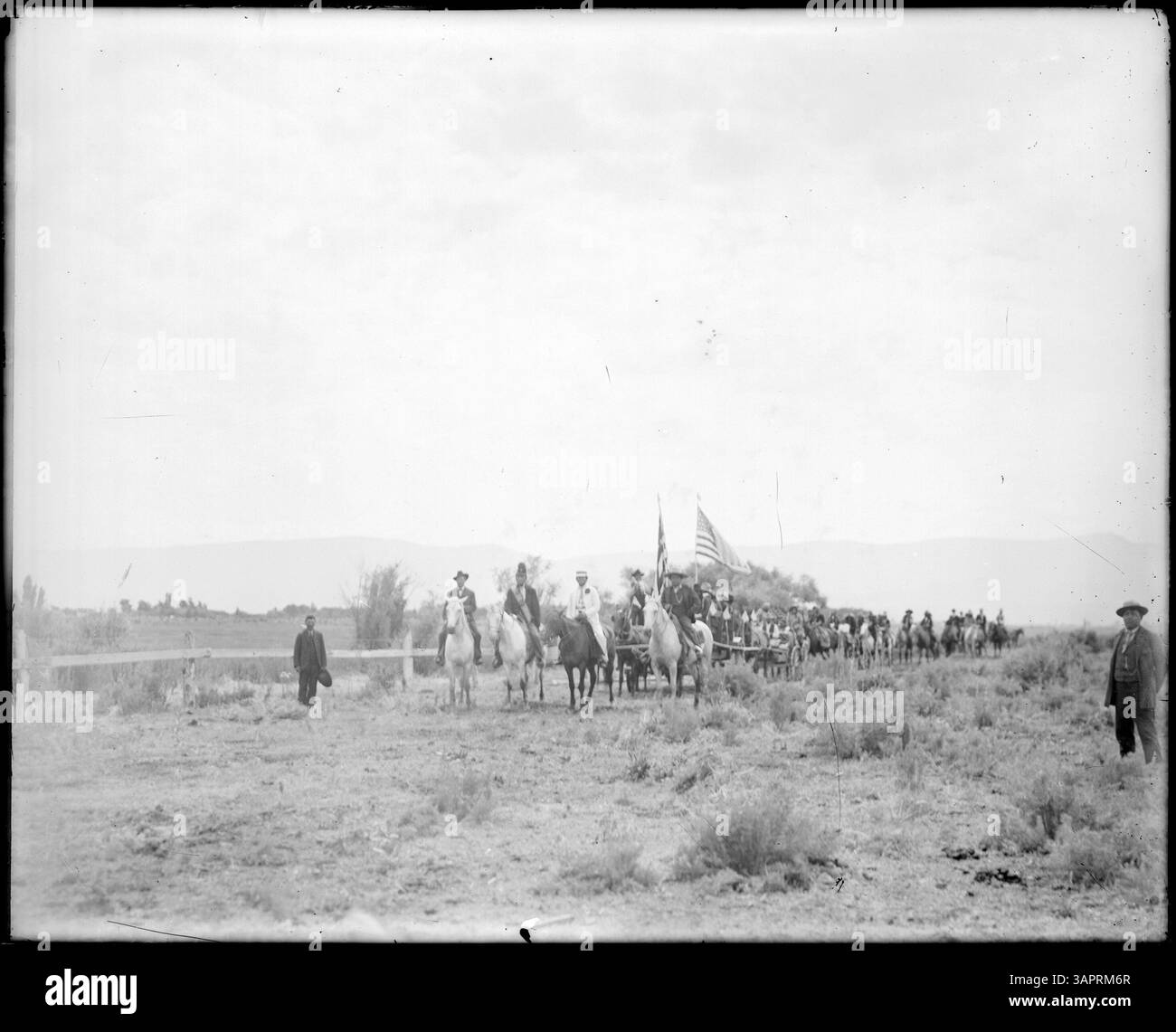 This photograph by Lee Moorhouse shows mounted men leading a file of ...