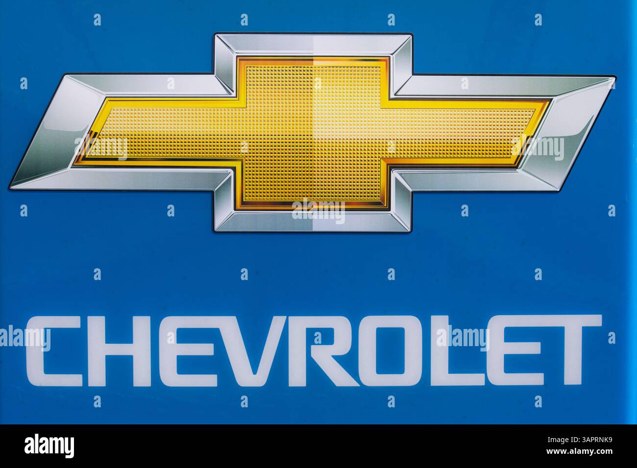 Chevrolet logo on the outside of a showroom. Tariffs imposed by the ...