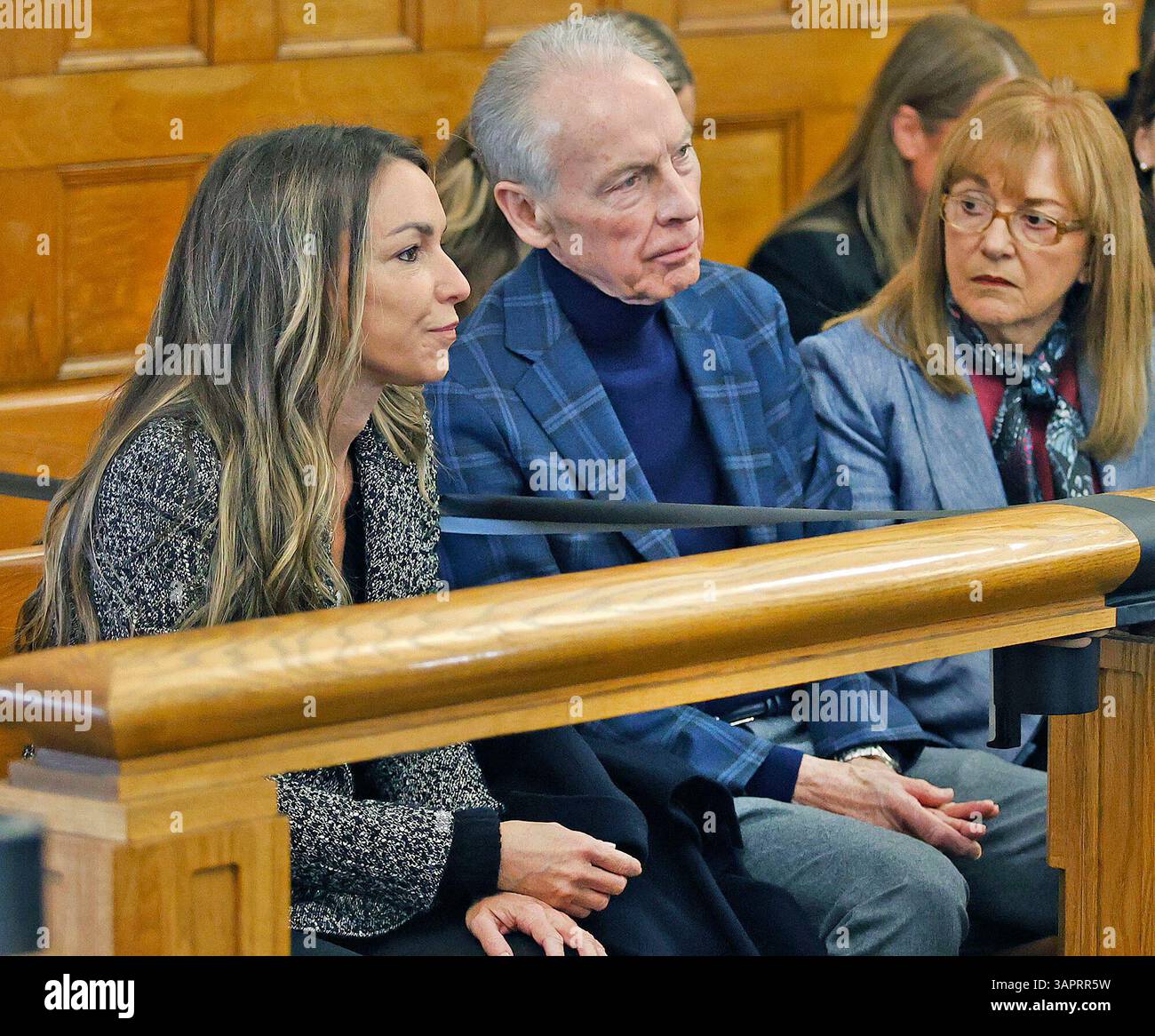 Karen Read sits with her parents William and Janet Read before court ...