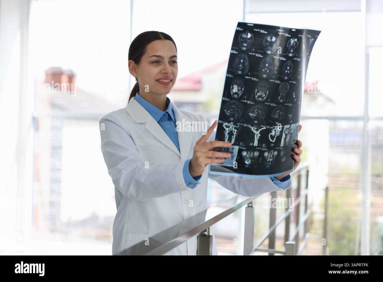 Doctor examining brain MRI scan in hospital Stock Photo - Alamy