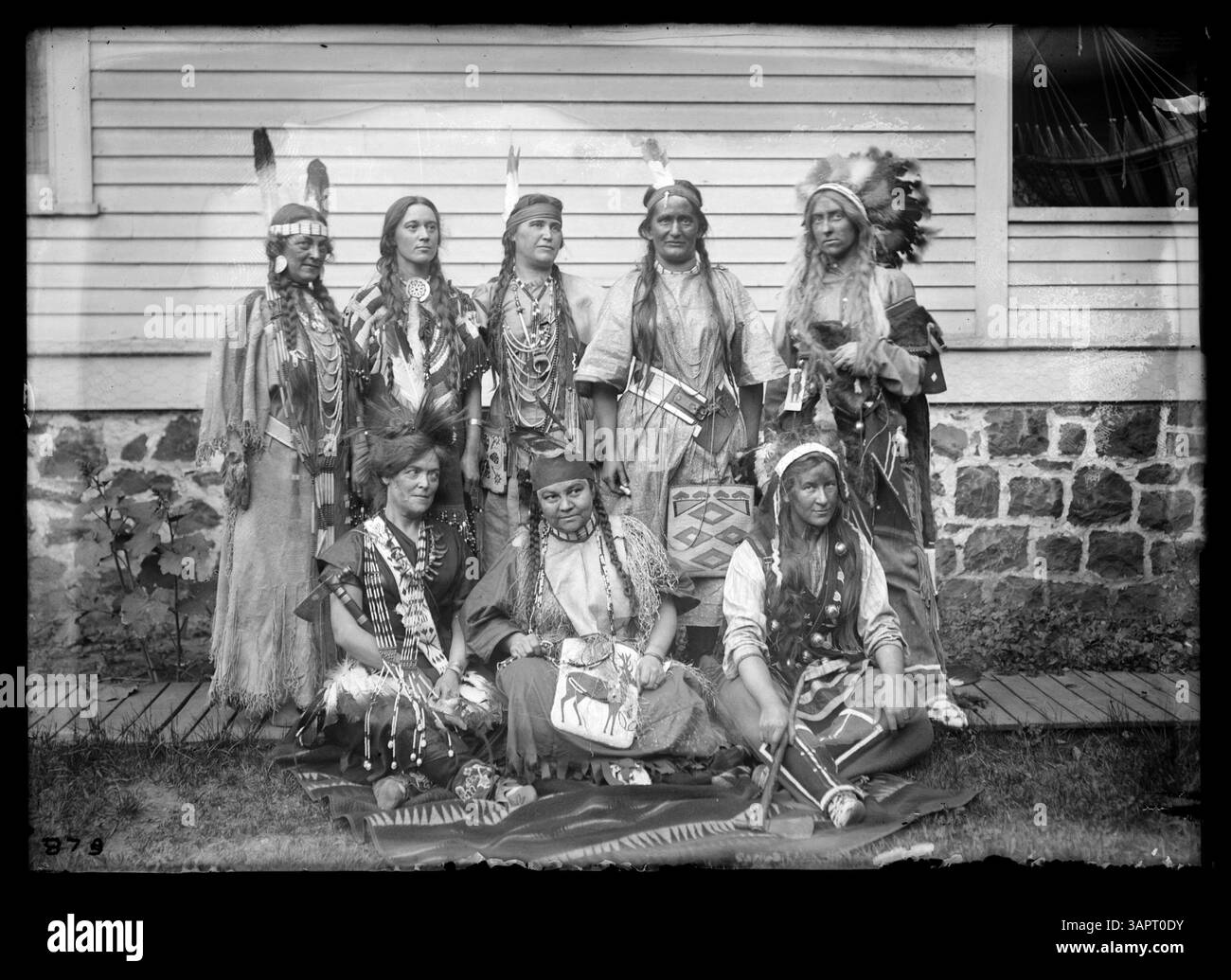 This photograph showcases a circus troupe in Indian costumes ...
