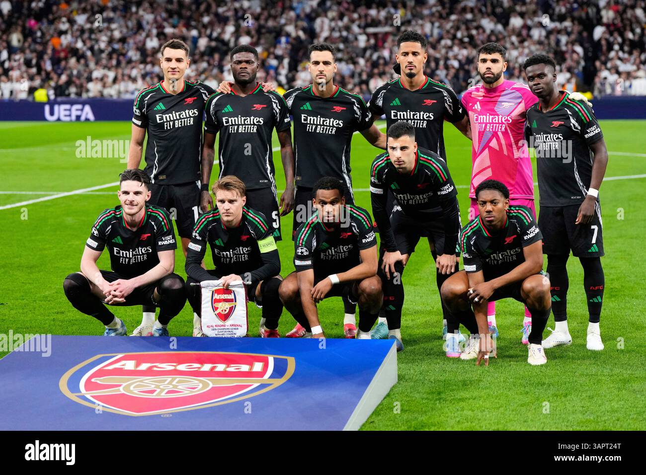 Arsenal players pose before the Champions League quarterfinals second ...