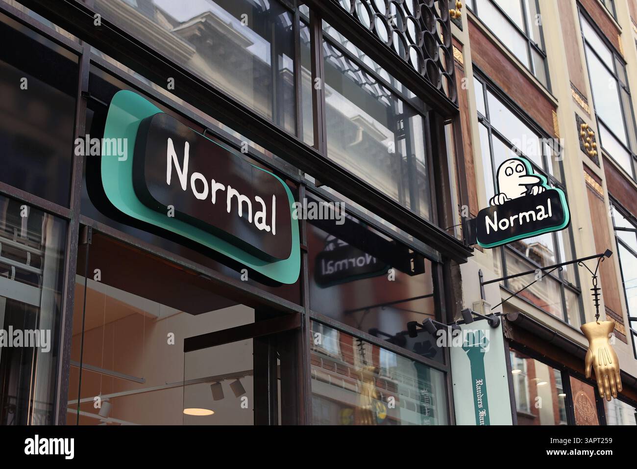 Logo and storefront of Danish bargain-priced retail chain Normal in ...
