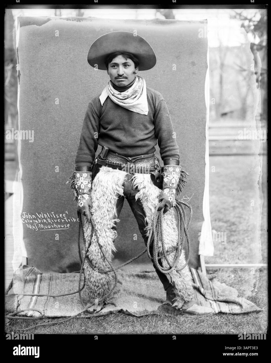 This photograph depicts John Walitsee, a Columbia River Indian, dressed ...