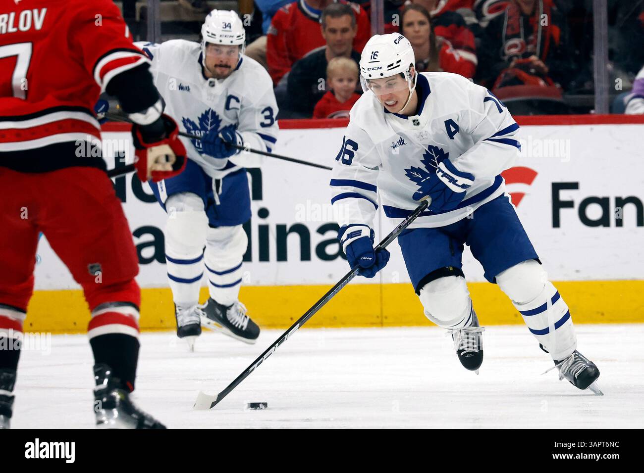 Toronto Maple Leafs' Mitch Marner (16) skates with the puck against the ...