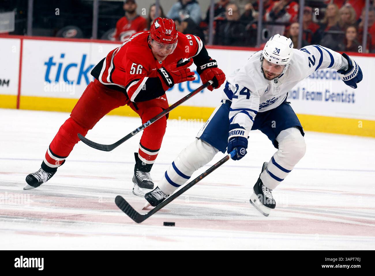 Toronto Maple Leafs' Scott Laughton (24) takes the puck away from ...