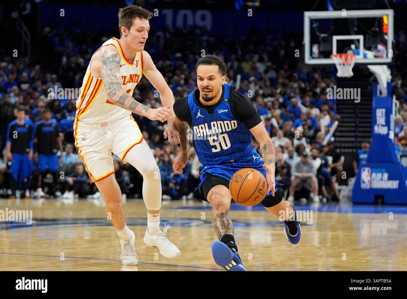 Orlando Magic guard Cole Anthony (50) drives to the basket past Atlanta ...