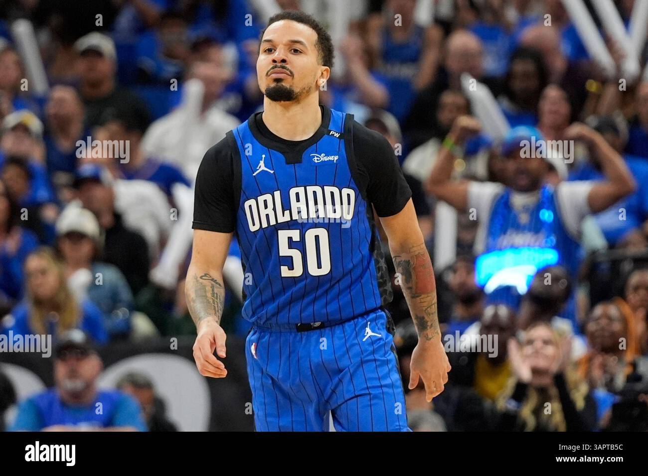 Orlando Magic guard Cole Anthony reacts after sinking a 3-point shot ...