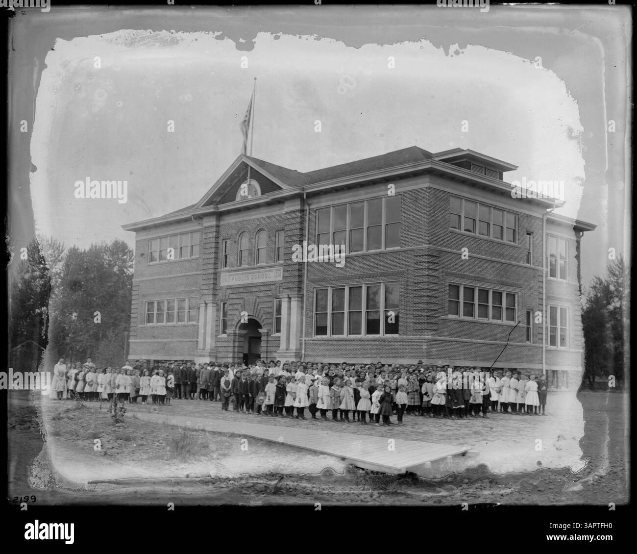 This photograph by Lee Moorhouse features a public school in Pendleton ...