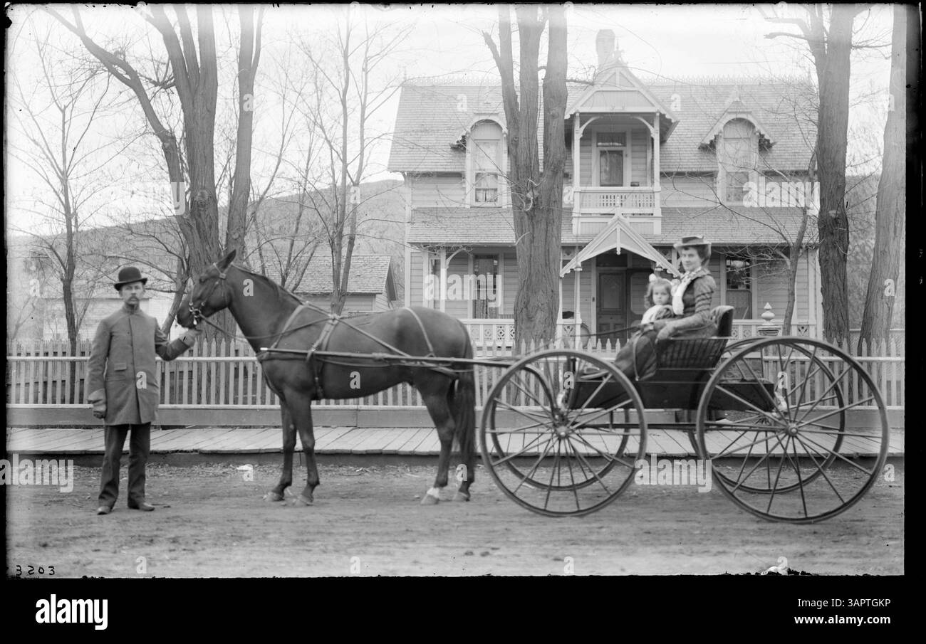 This photograph showcases horse-drawn vehicles, including buggies and ...