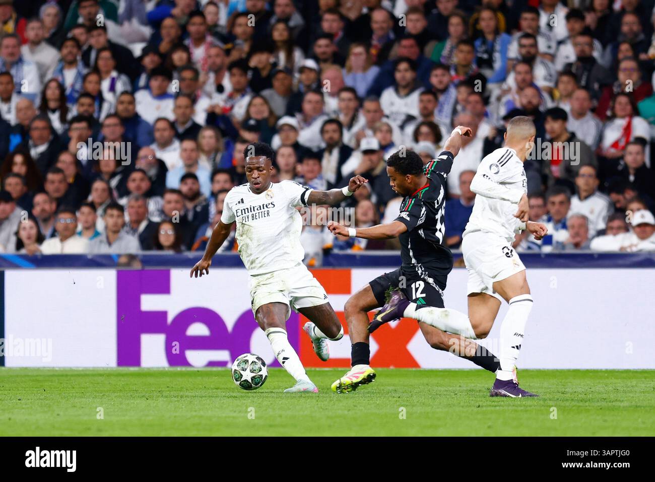 Vinicius Junior of Real Madrid and Jurrien Timber of Arsenal FC in ...