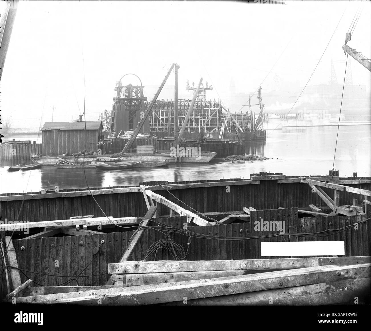 Workers pour concrete into Piers #7 and #8 during the construction of ...