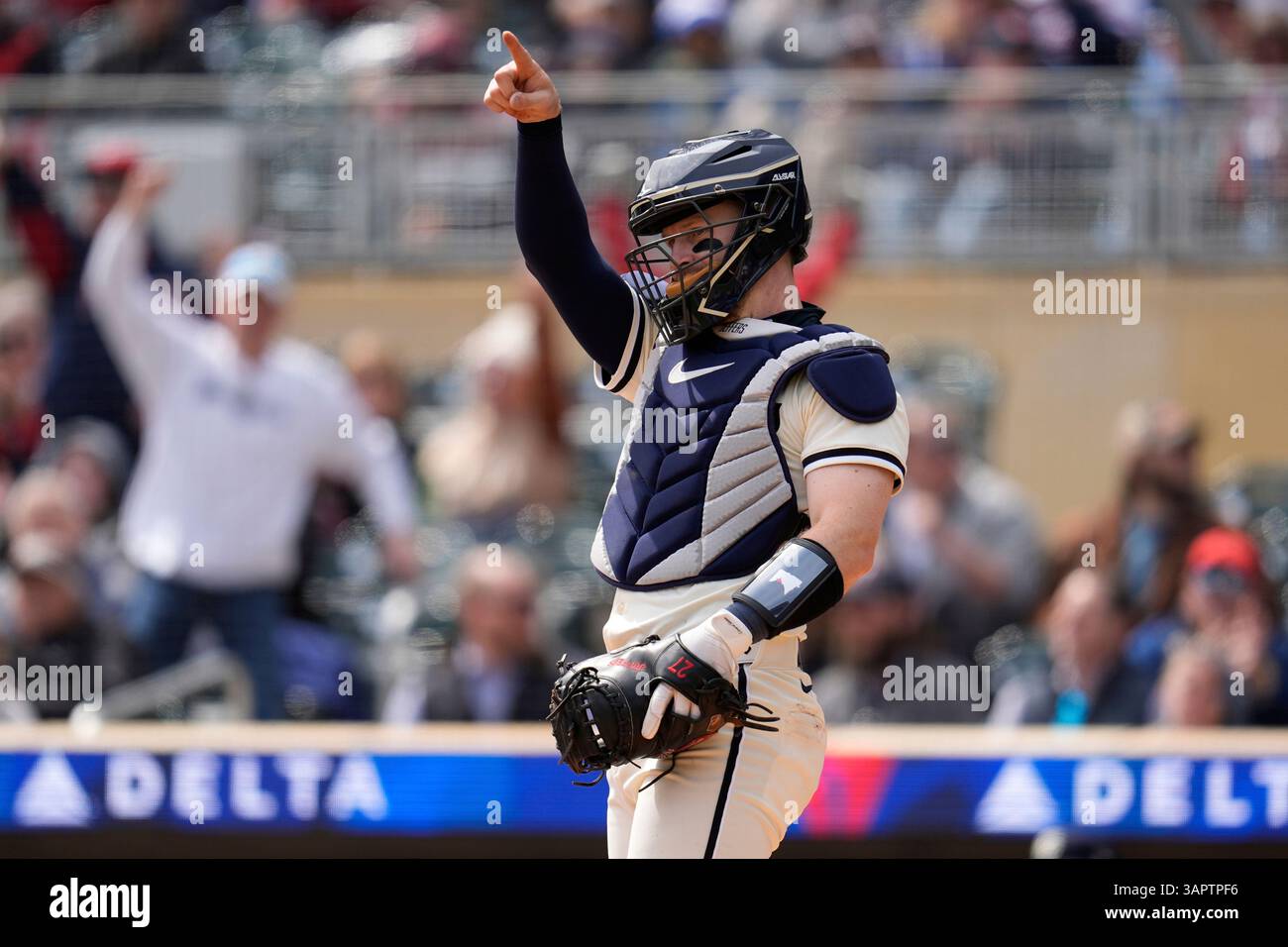 Minnesota Twins catcher Ryan Jeffers (27) points to left fielder ...