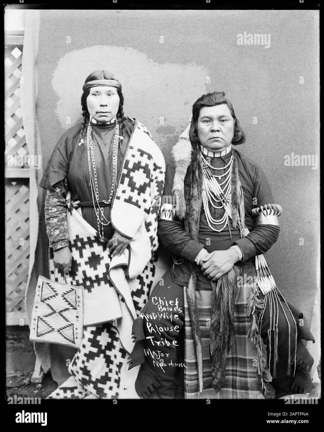 This photograph shows Chief Bones and his wife from the Palouse Tribe ...