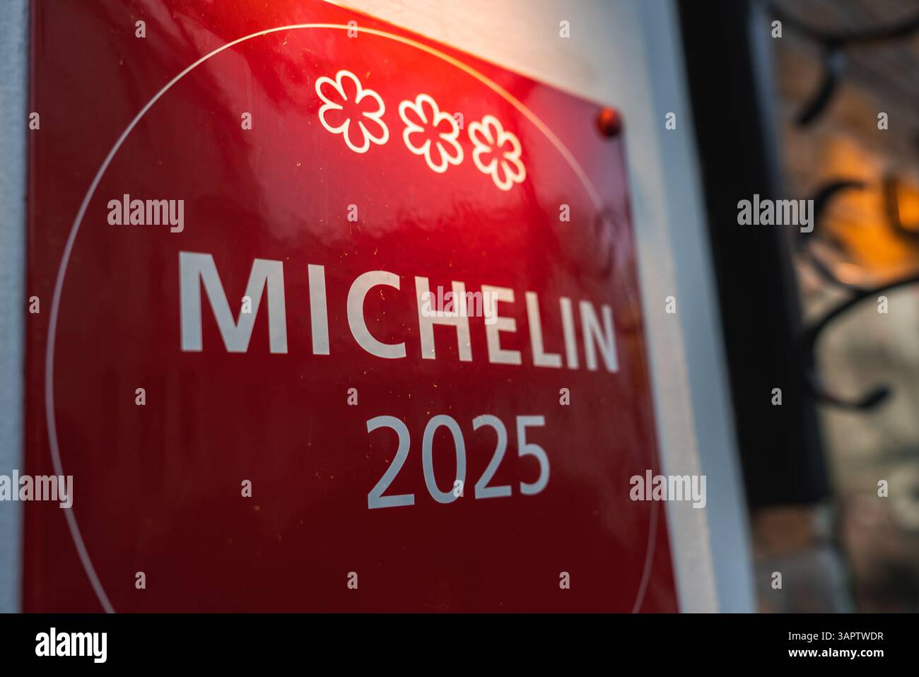 Red Michelin 2025 Plaque with Three Stars on Light Wall Stock Photo - Alamy