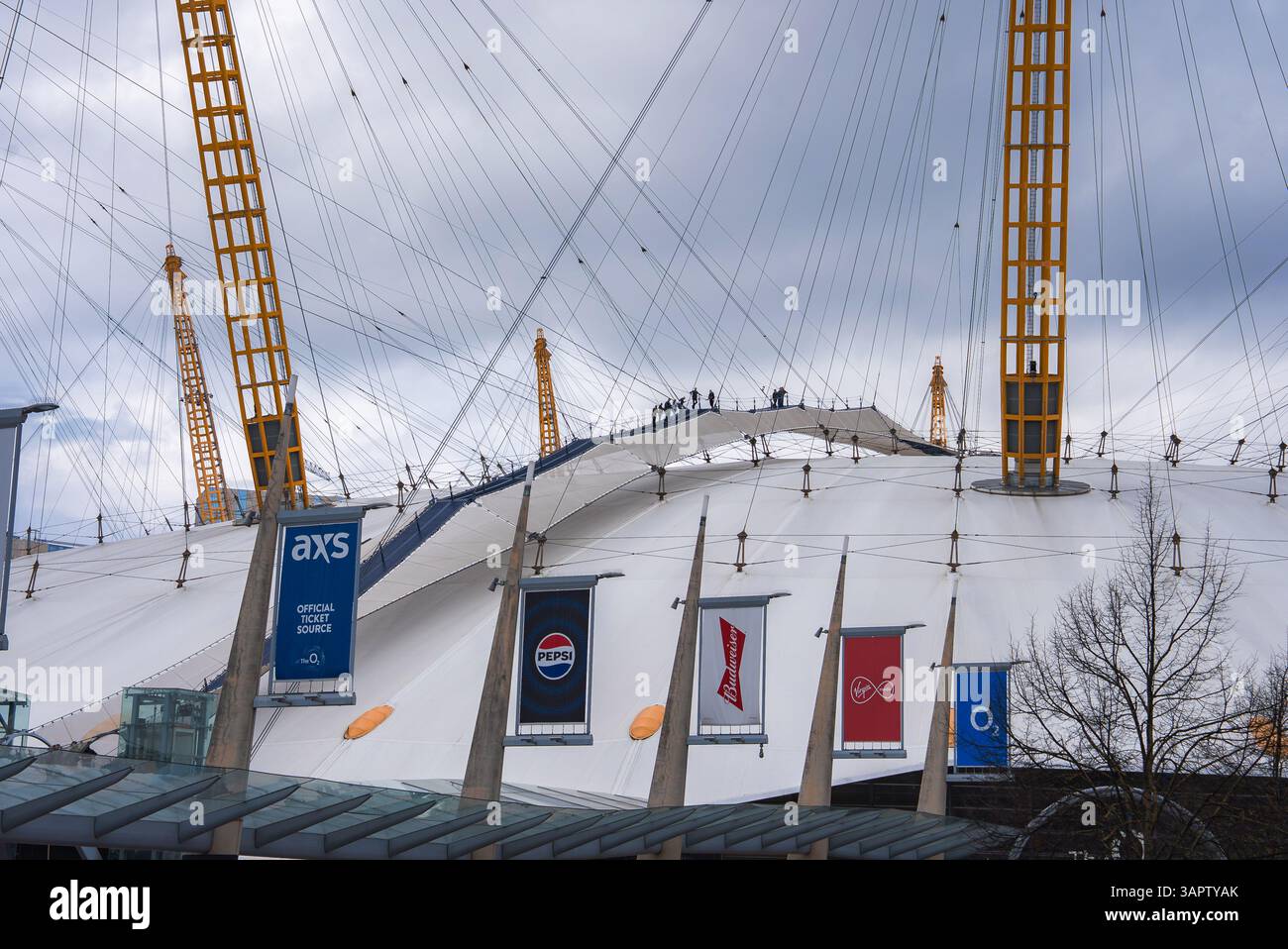 O2 Arena in London with Climbers on Dome and Brand Banners Stock Photo ...