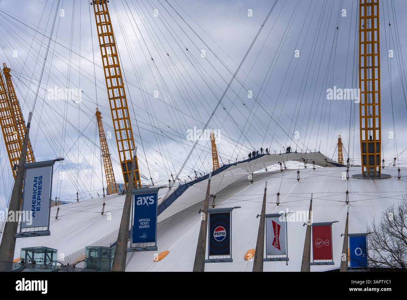 The O2 Arena in London with Climbers and Branded Banners Stock Photo ...