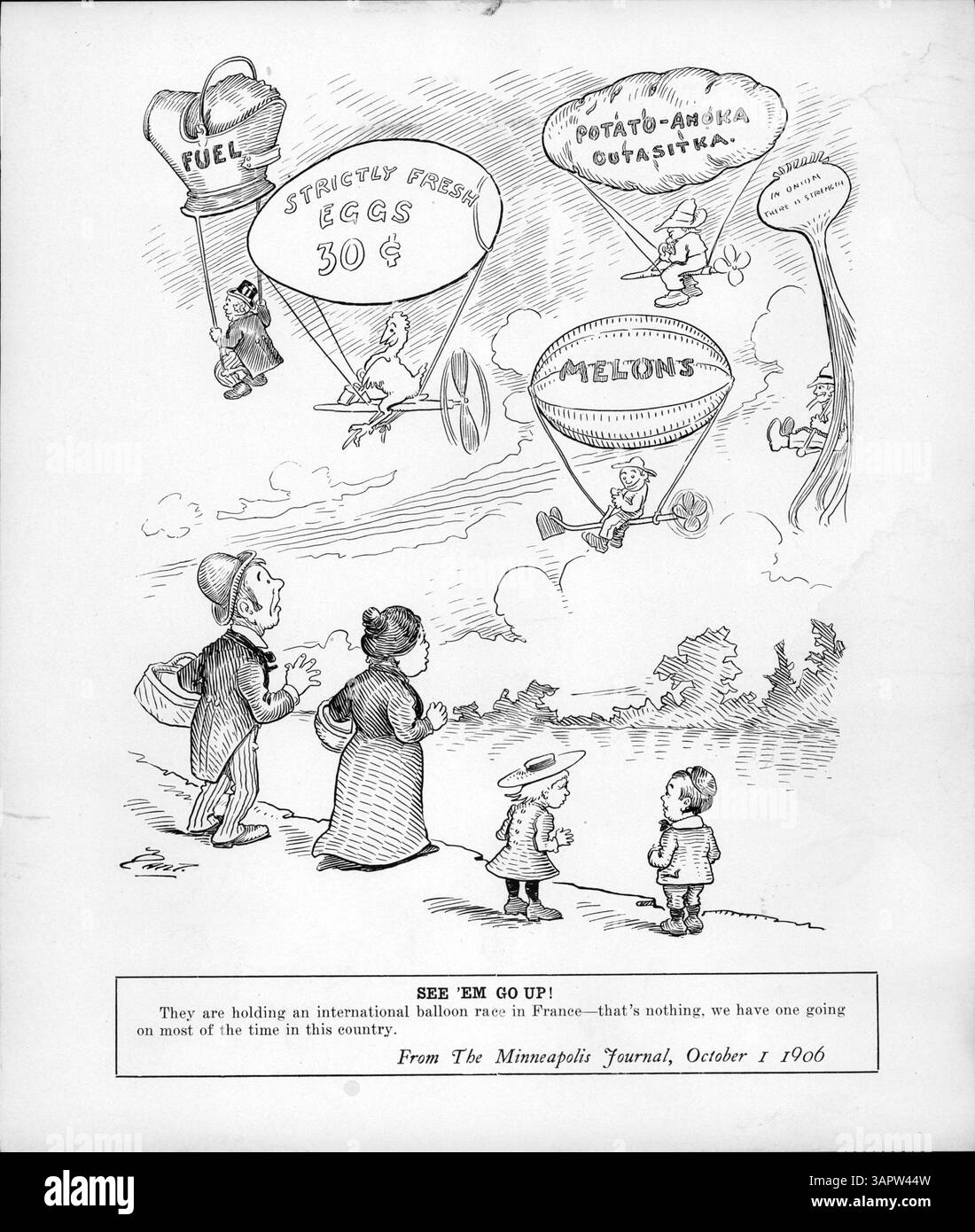 A family watches balloons labeled with various food items and prices ...