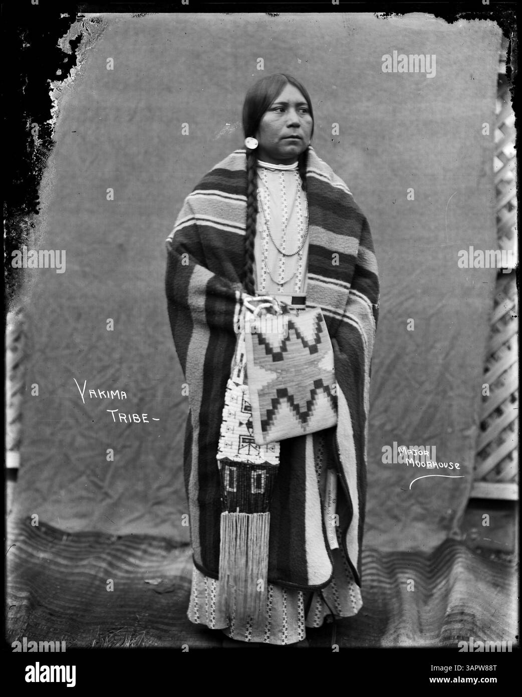 This photograph shows Emily, a Yakima tribal woman, dressed in ...