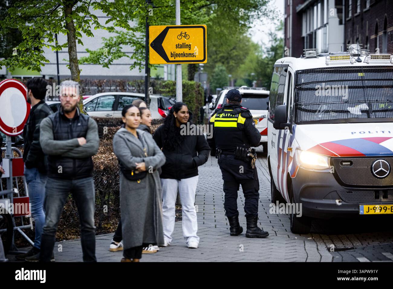 UDEN - Police during a residents' meeting about a planned azc in Uden ...