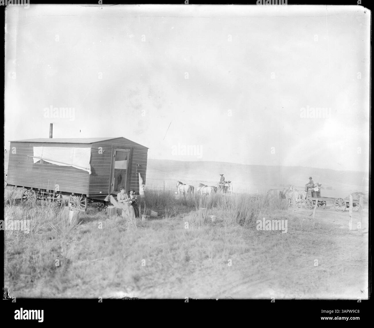 Photograph by Lee Moorhouse showing a chuck wagon with a threshing ...