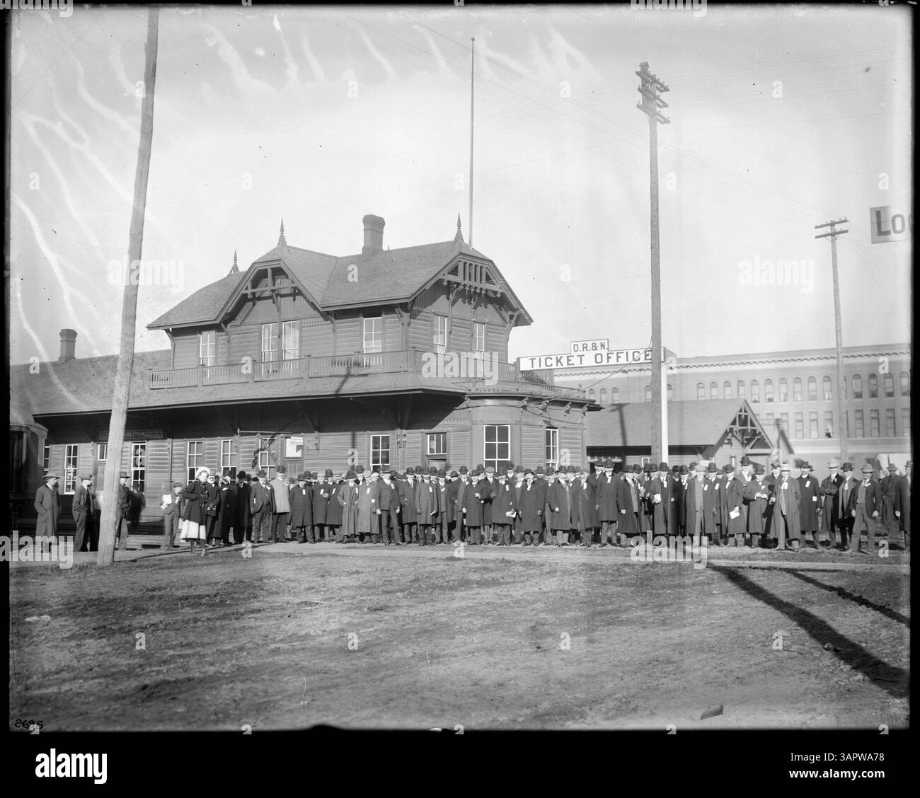 This image shows the O.R.N. depot at Pendleton with a group of men in ...