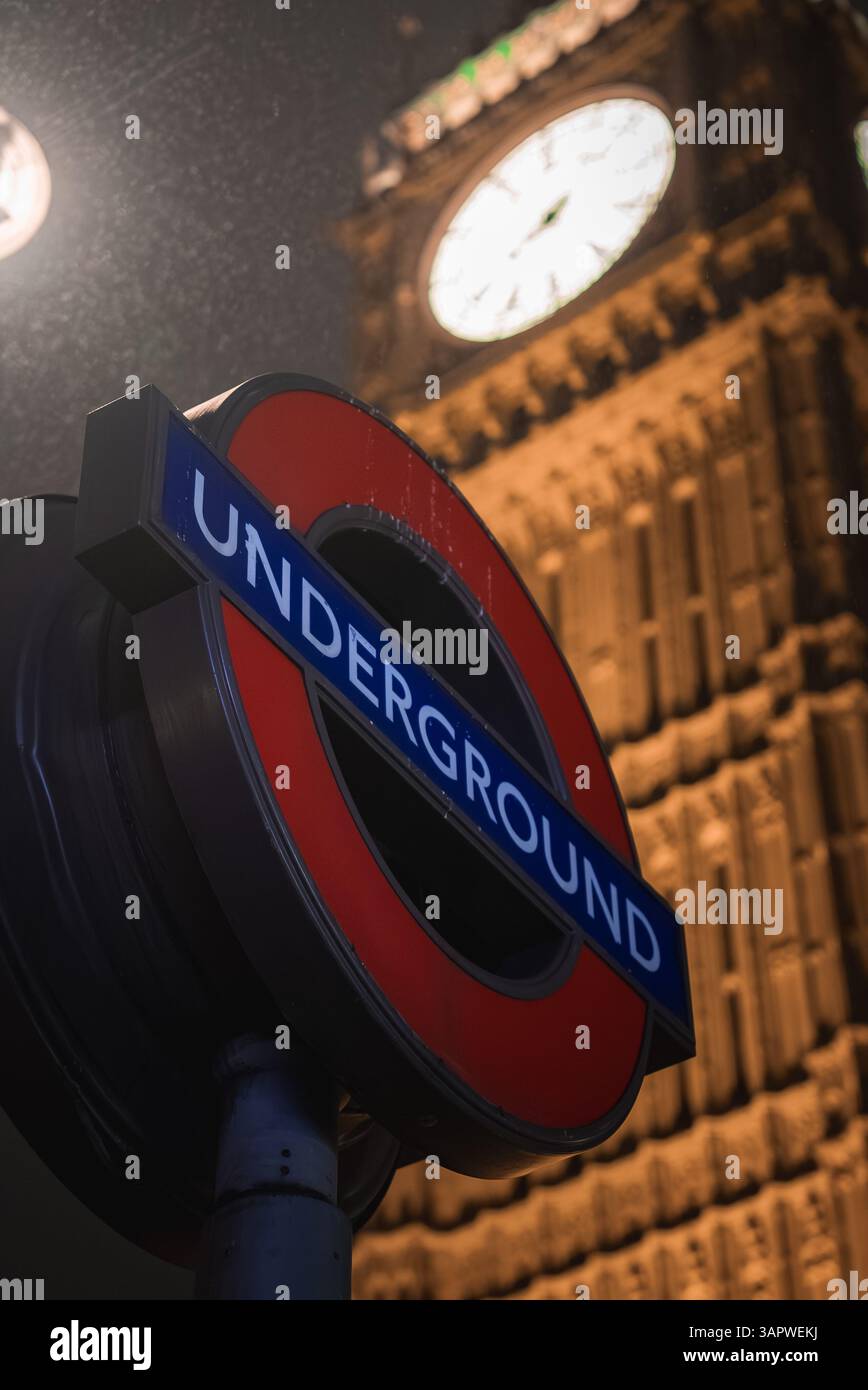 Close Up of London Underground Sign with Big Ben at Night Stock Photo ...